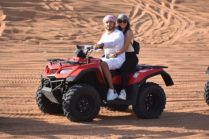 Evening Desert Safari With Quad Bike & BBQ Dinner/ Camel Trekking/ Sand Surfing